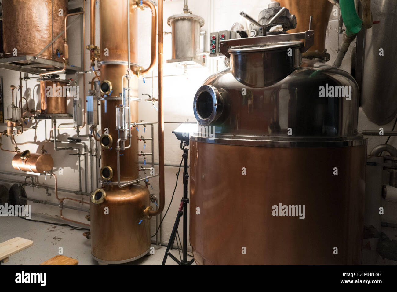 Copper still alembic inside distillery to distill grapes and produce ...