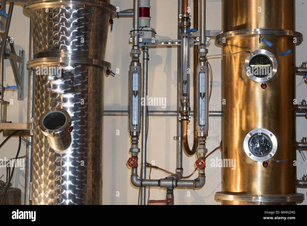 Copper still alembic inside distillery to distill grapes and produce ...
