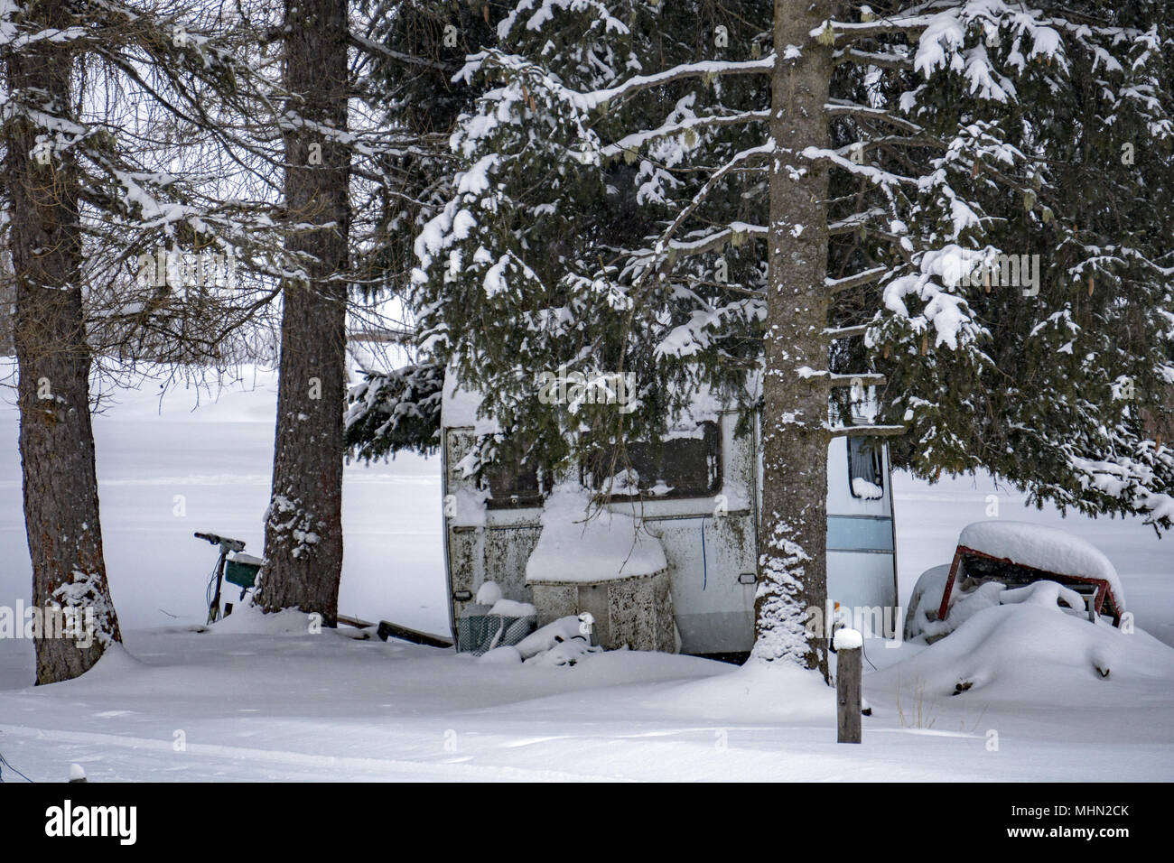 rv trailer caravan roulotte covered by snow in winter time Stock Photo ...