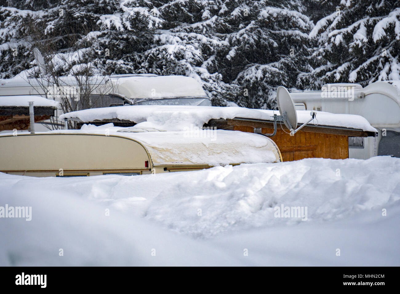 rv trailer caravan roulotte covered by snow in winter time Stock Photo ...