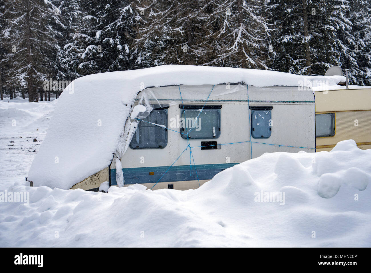 rv trailer caravan roulotte covered by snow in winter time Stock Photo ...