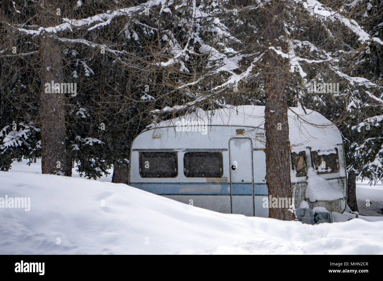 rv trailer caravan roulotte covered by snow in winter time Stock Photo ...