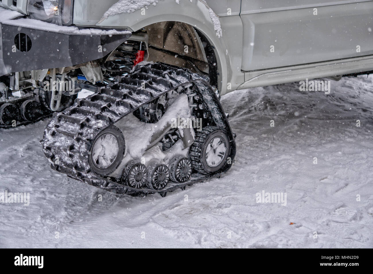 tracked snowmobile detail close up Stock Photo - Alamy