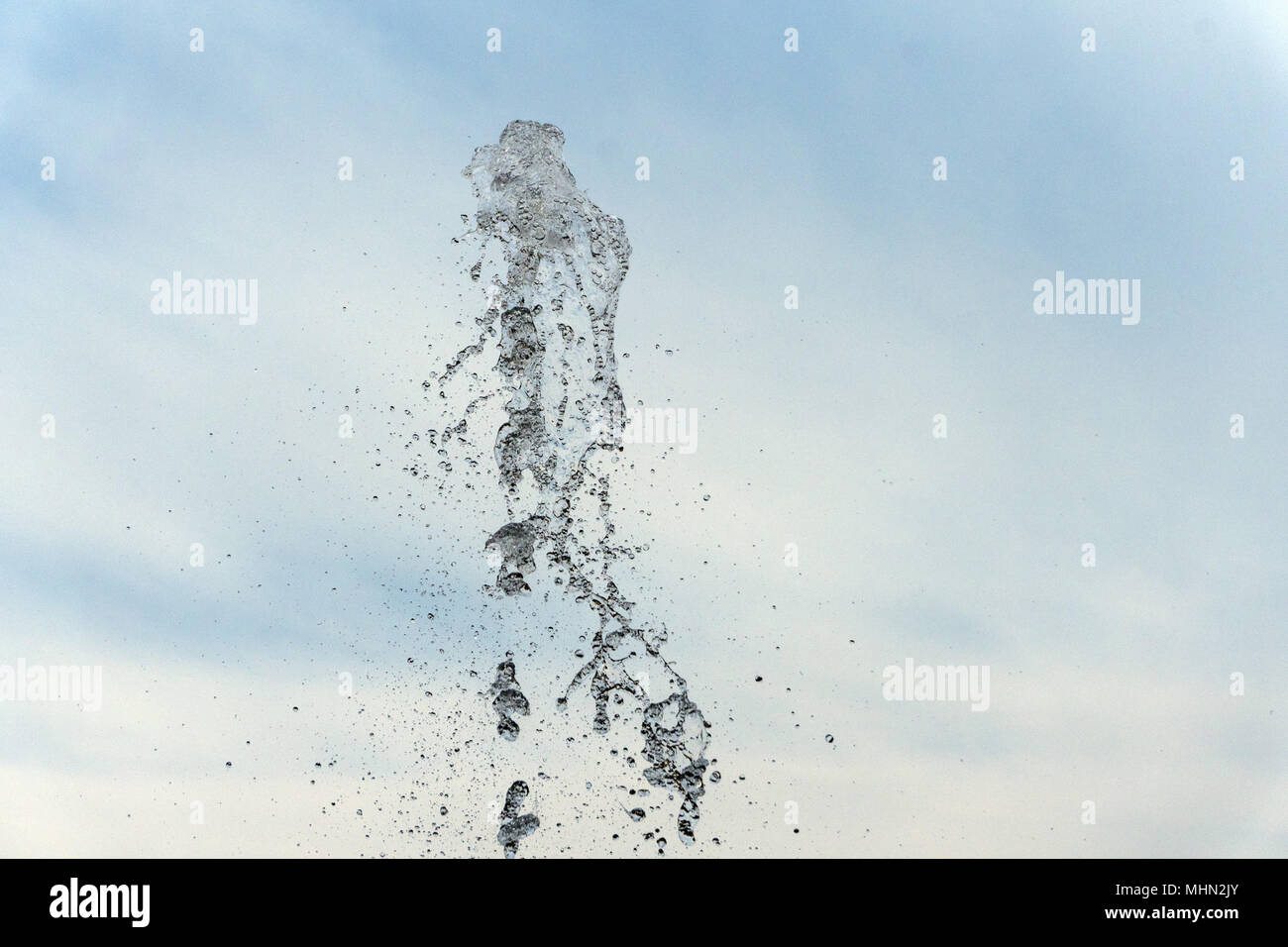 water spurt detail isolated on sky background Stock Photo - Alamy