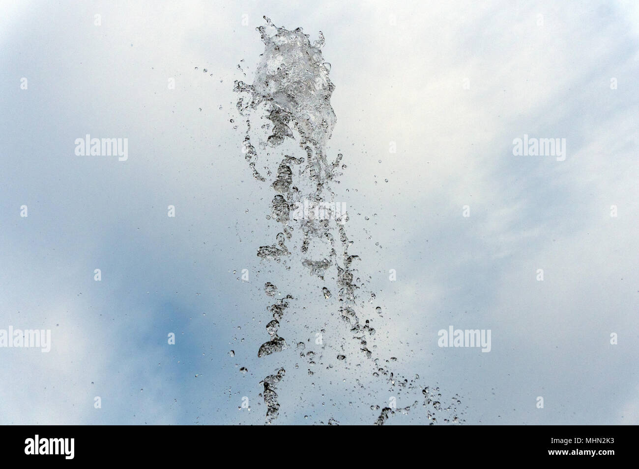 water spurt detail isolated on sky background Stock Photo - Alamy