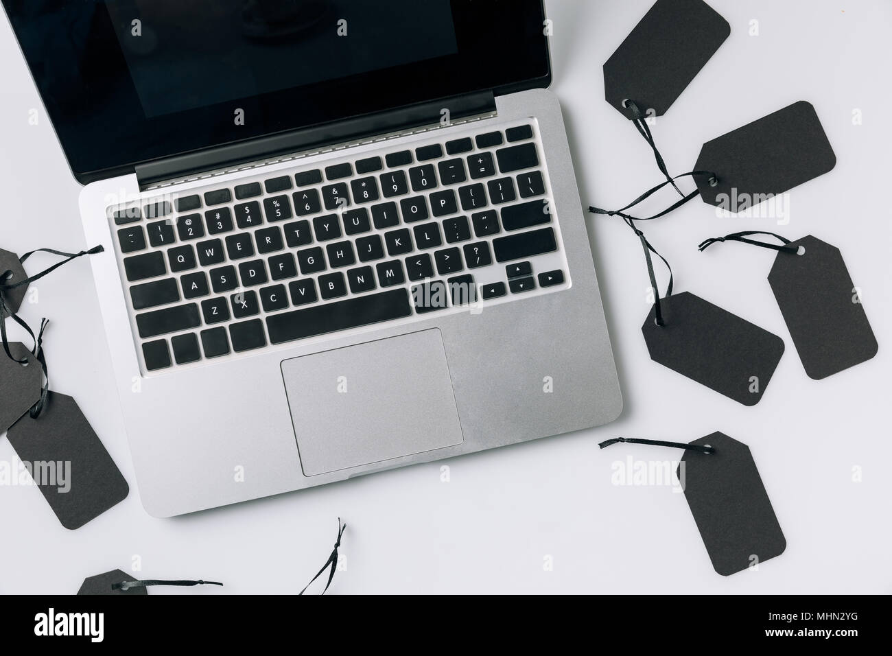 laptop and blank labels Stock Photo - Alamy