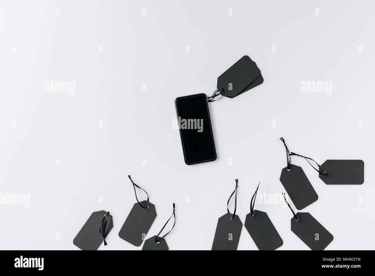 smartphone and blank tags Stock Photo - Alamy