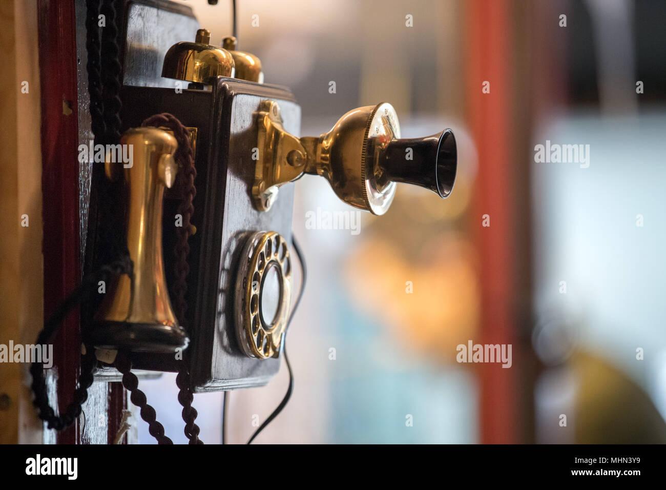 old antique wall telephone close up Stock Photo - Alamy