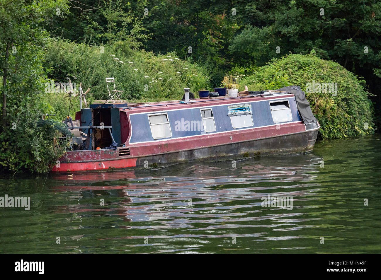 rusty rugged ship and boat in thames river Stock Photo - Alamy