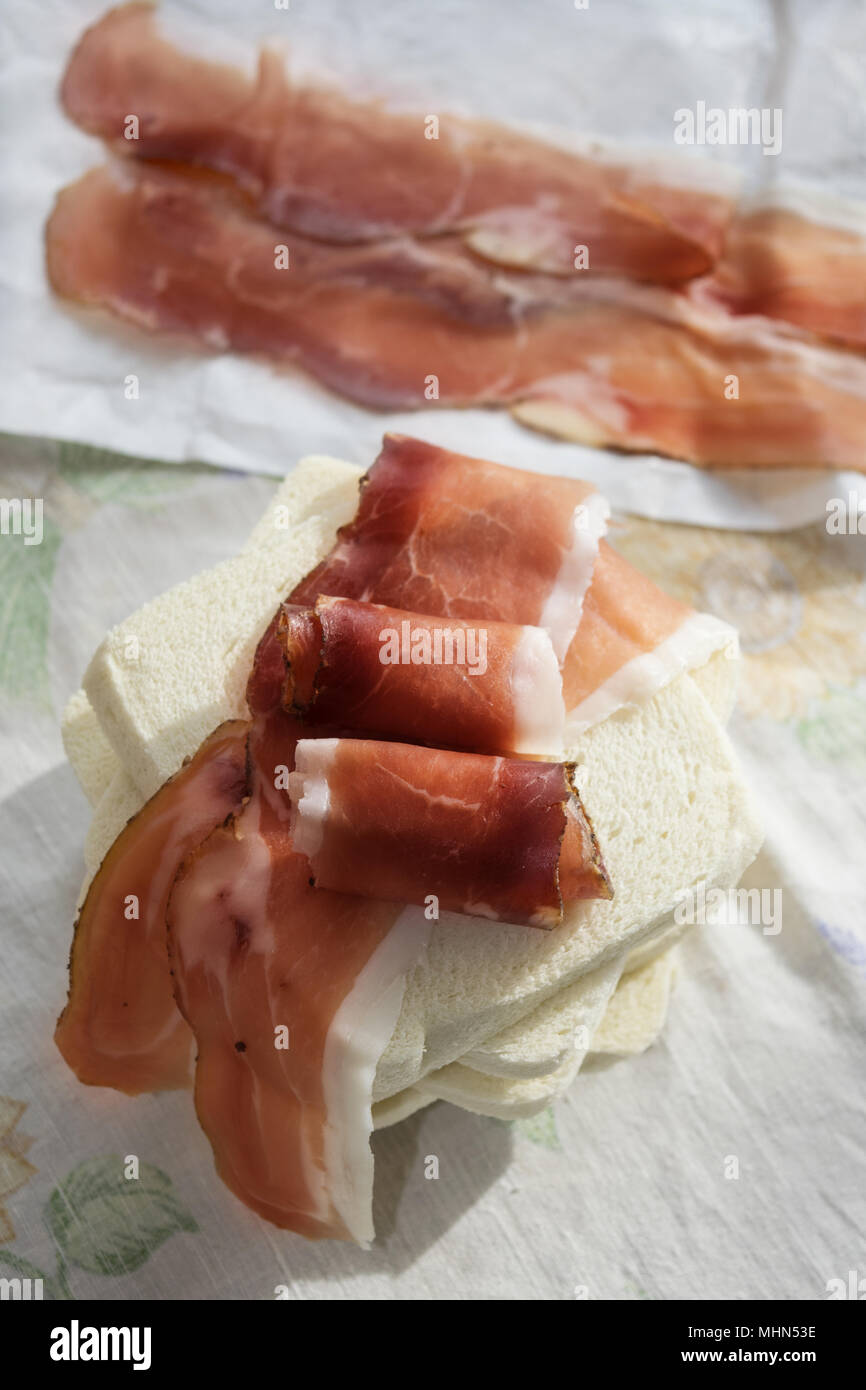 light meal consisting in a sandwich with italian speck or salted smoked ...