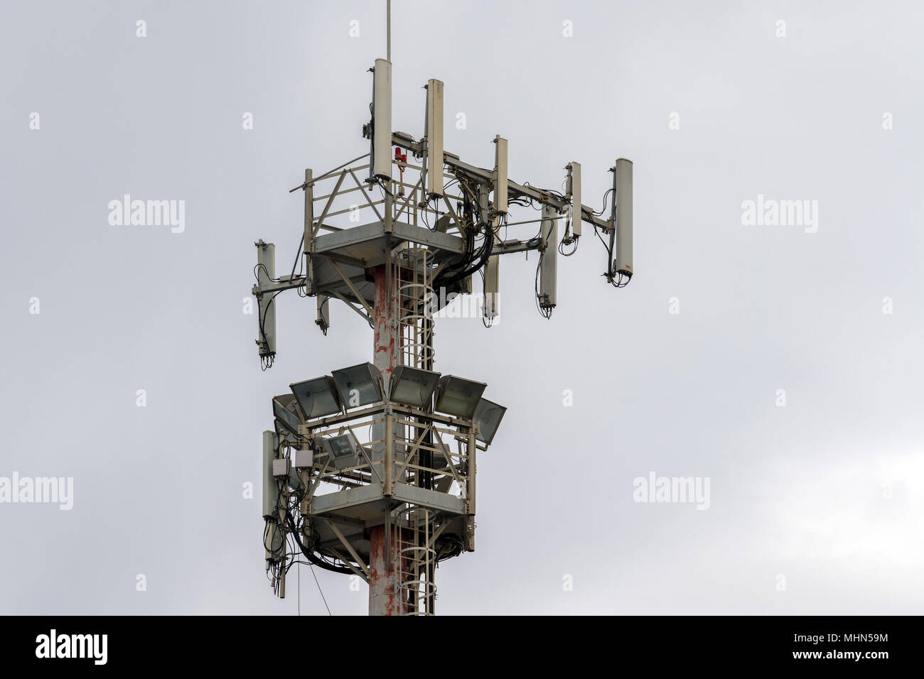 cellular Communication Antenna on the white sky background Stock Photo ...