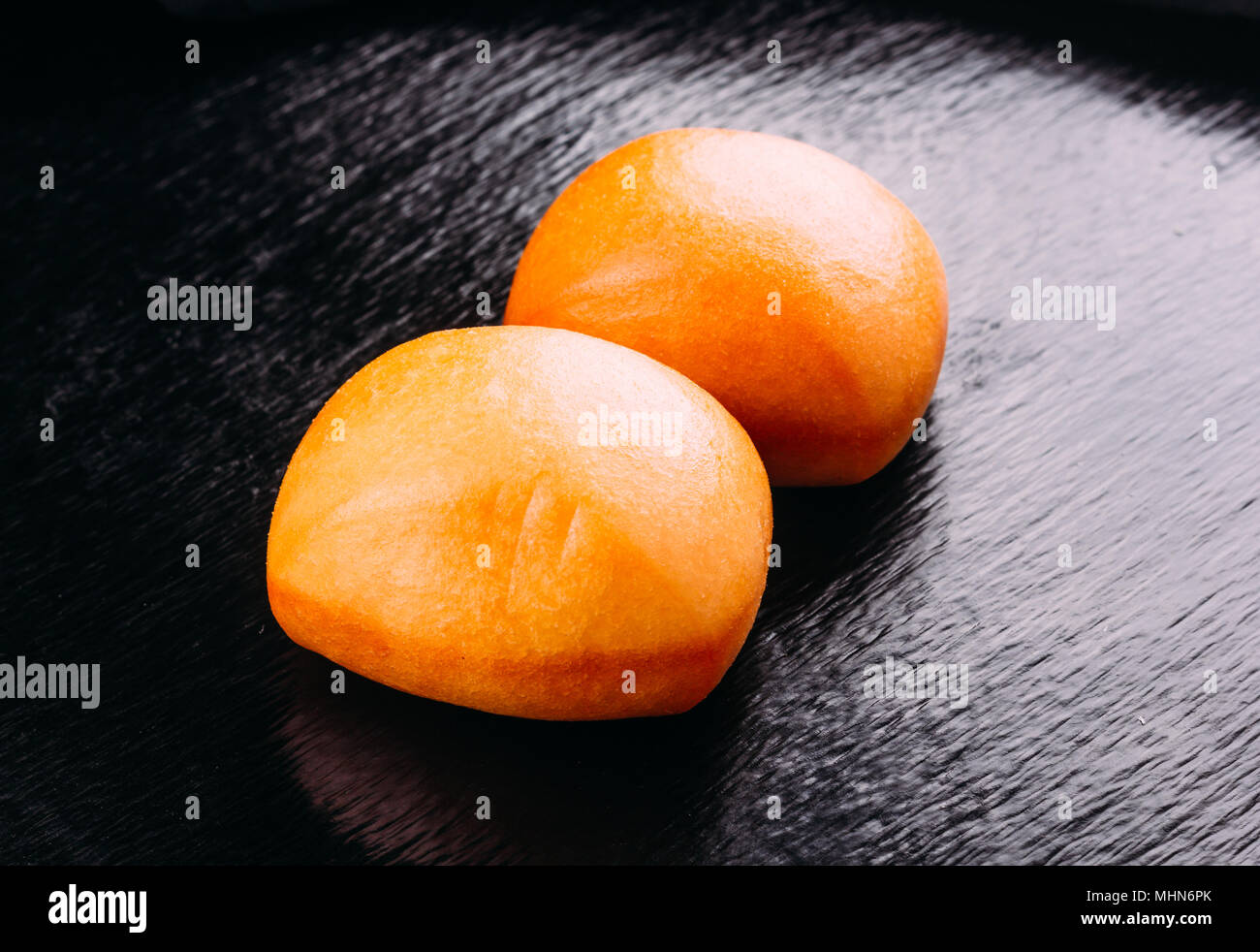 japanese red bean bread isolated on dark background Stock Photo - Alamy