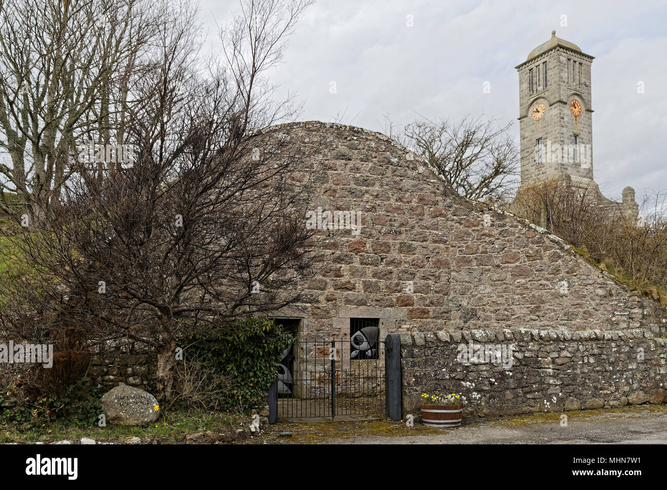 Helmsdale Ice House with Kildonan War Memorial in background Stock ...