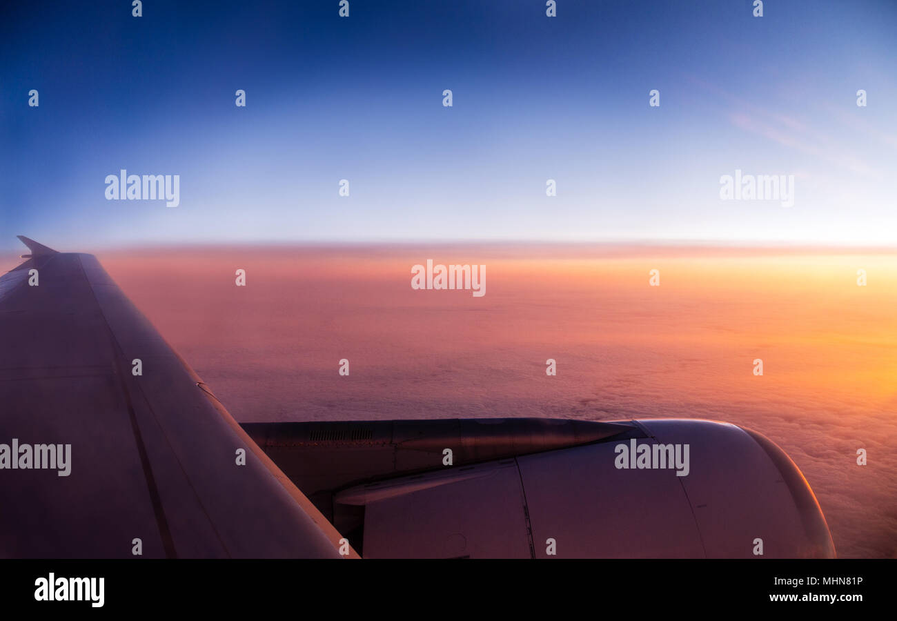 View sunrise from airplane hi-res stock photography and images - Alamy