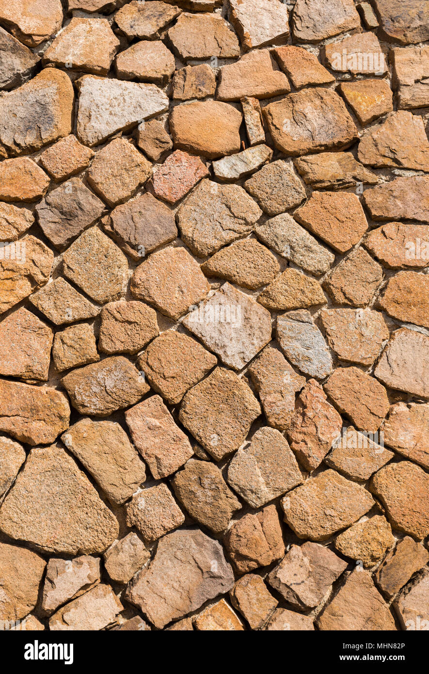 Wall of irregular stones hi-res stock photography and images - Alamy