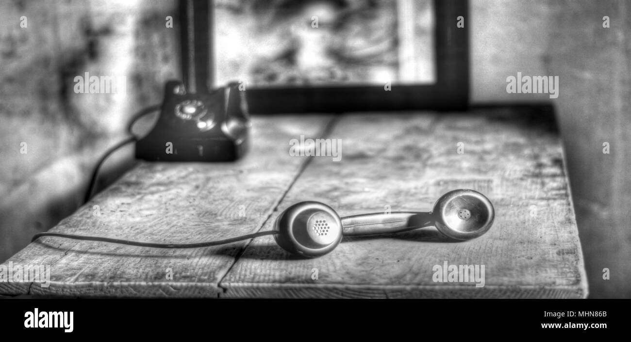An old telephone now forgotten Stock Photo - Alamy
