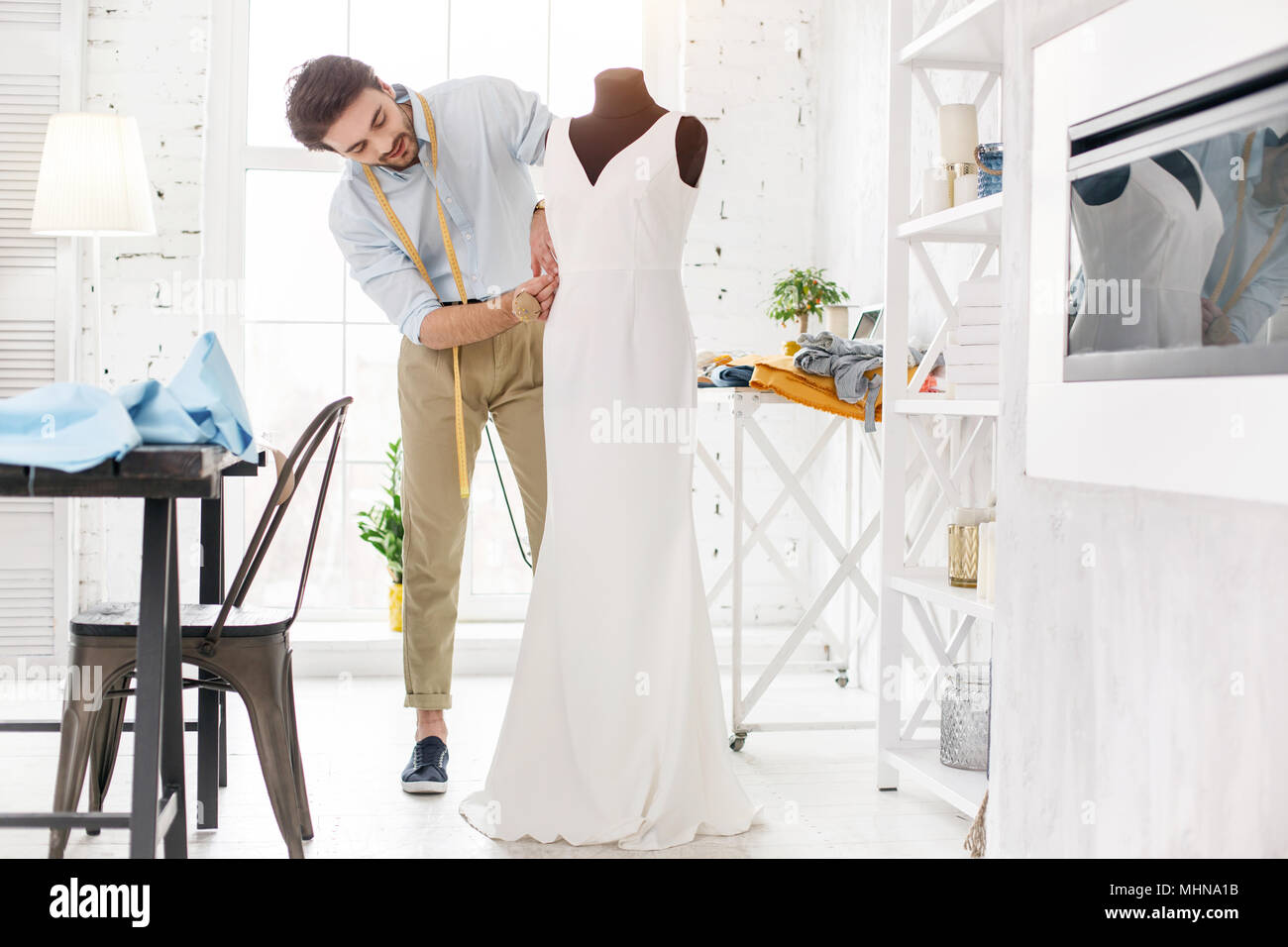 Tailor new hi-res stock photography and images - Alamy