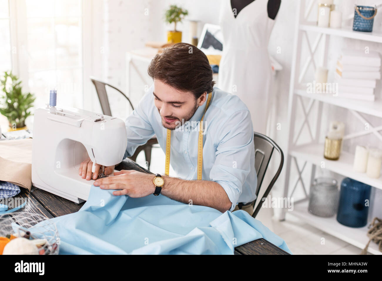 Professional tailoring hi-res stock photography and images - Alamy