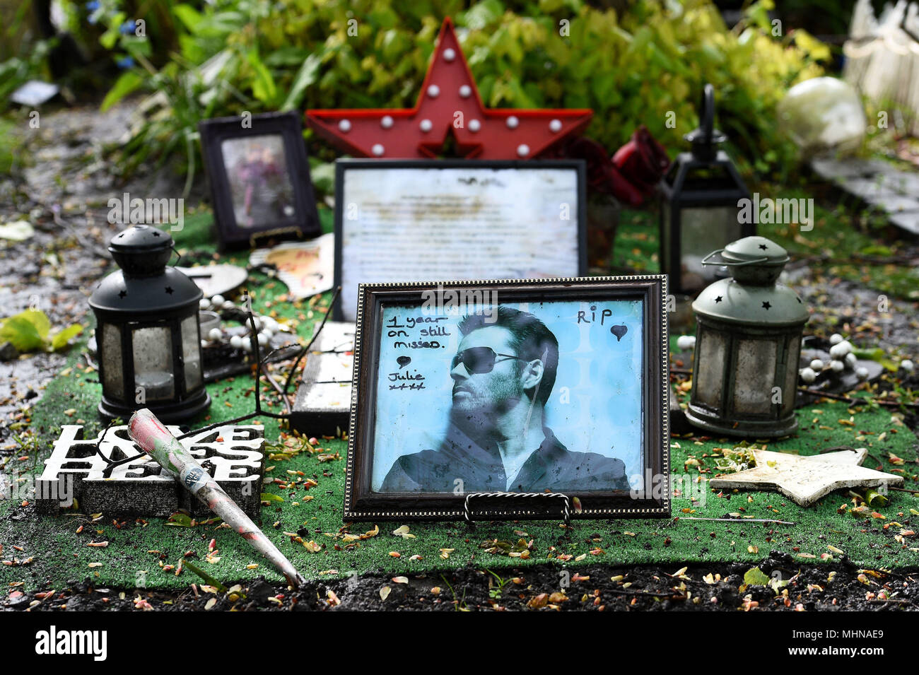Tributes to George Michael outside his house in Highgate, north London ...