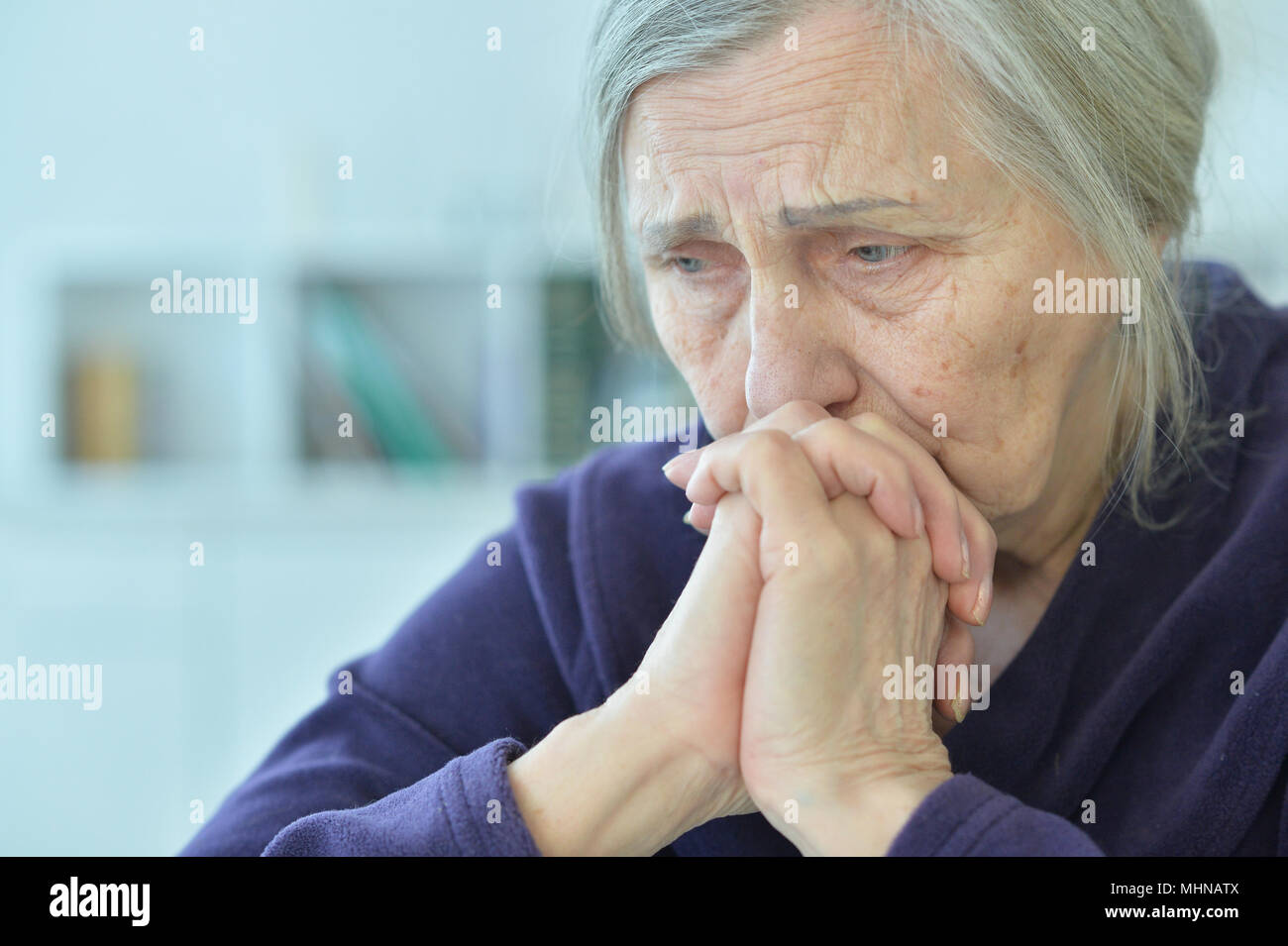 sad senior woman Stock Photo - Alamy