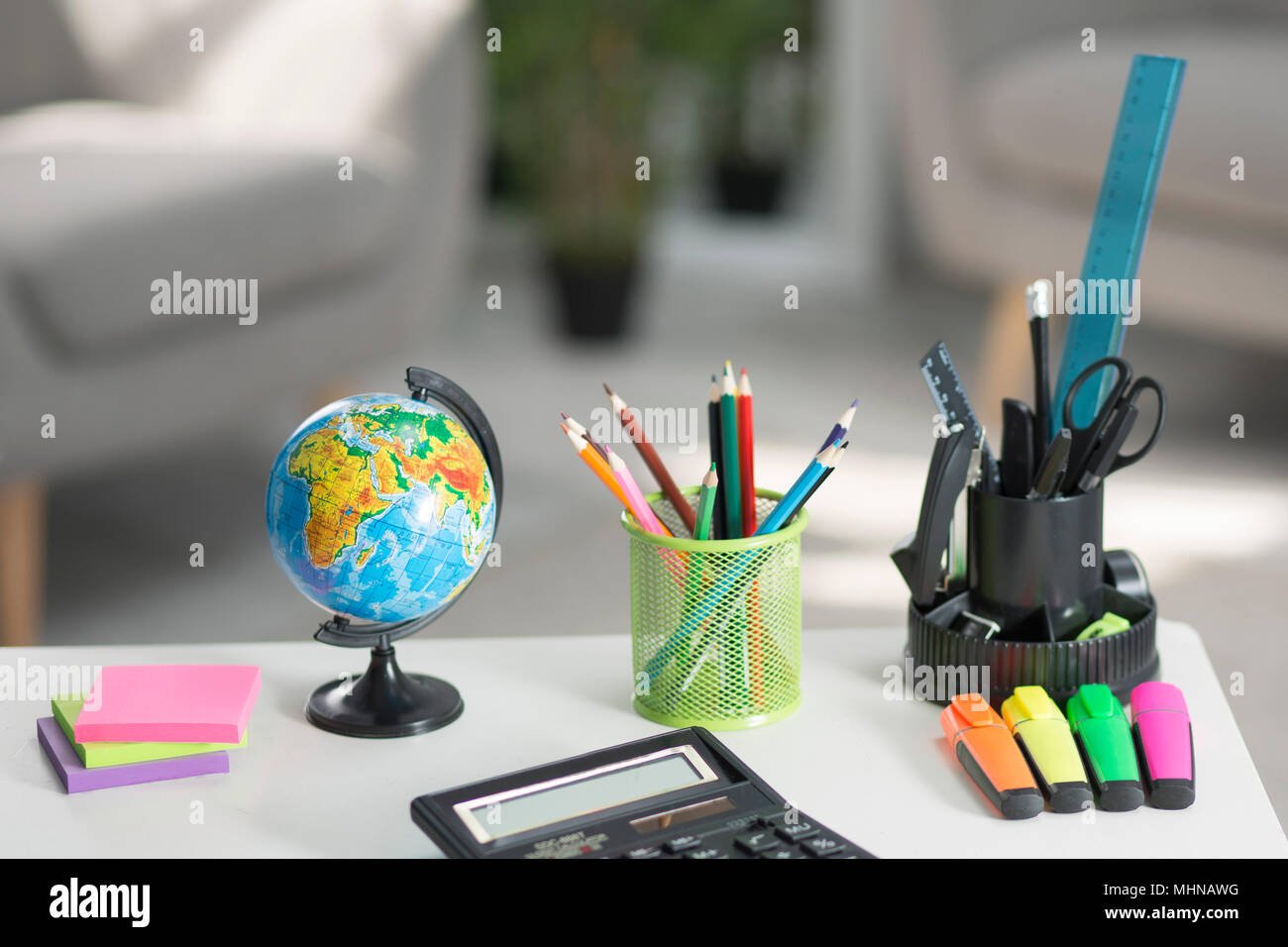 The school backpack is on the table. School supplies Stock Photo - Alamy