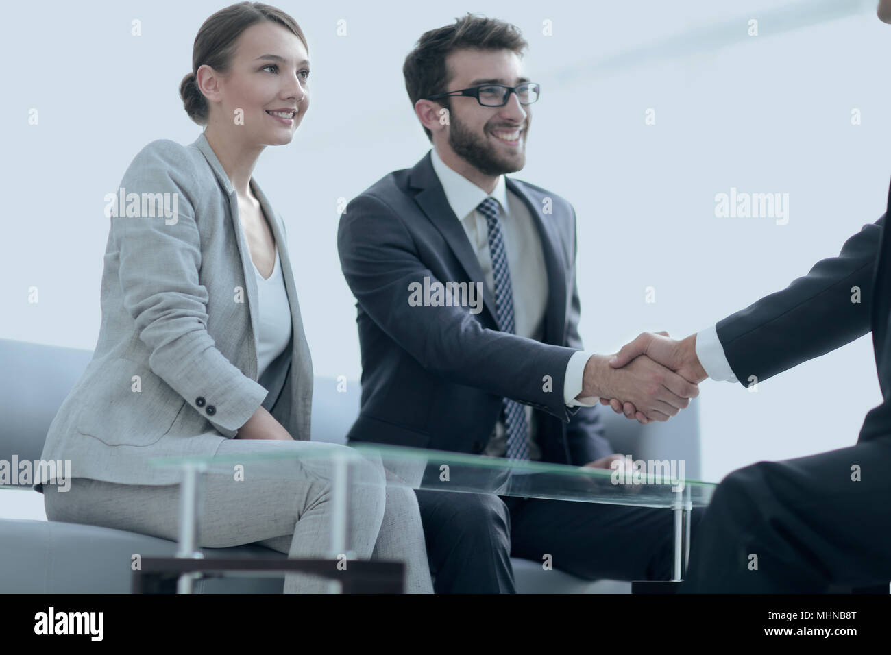 handshake business partners in the office Stock Photo - Alamy