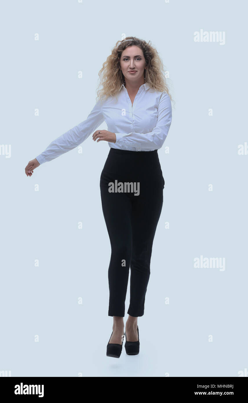 business woman striding confidently forward Stock Photo - Alamy
