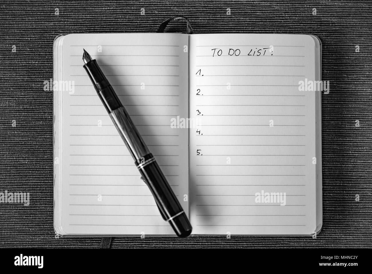 Notebook goal list pen Black and White Stock Photos & Images - Alamy
