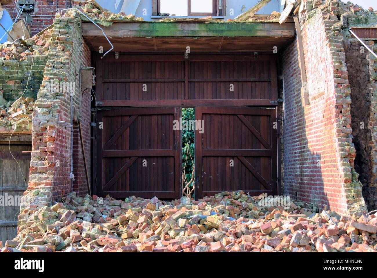 Construction, industry and demolition concept: demolition of the house ...