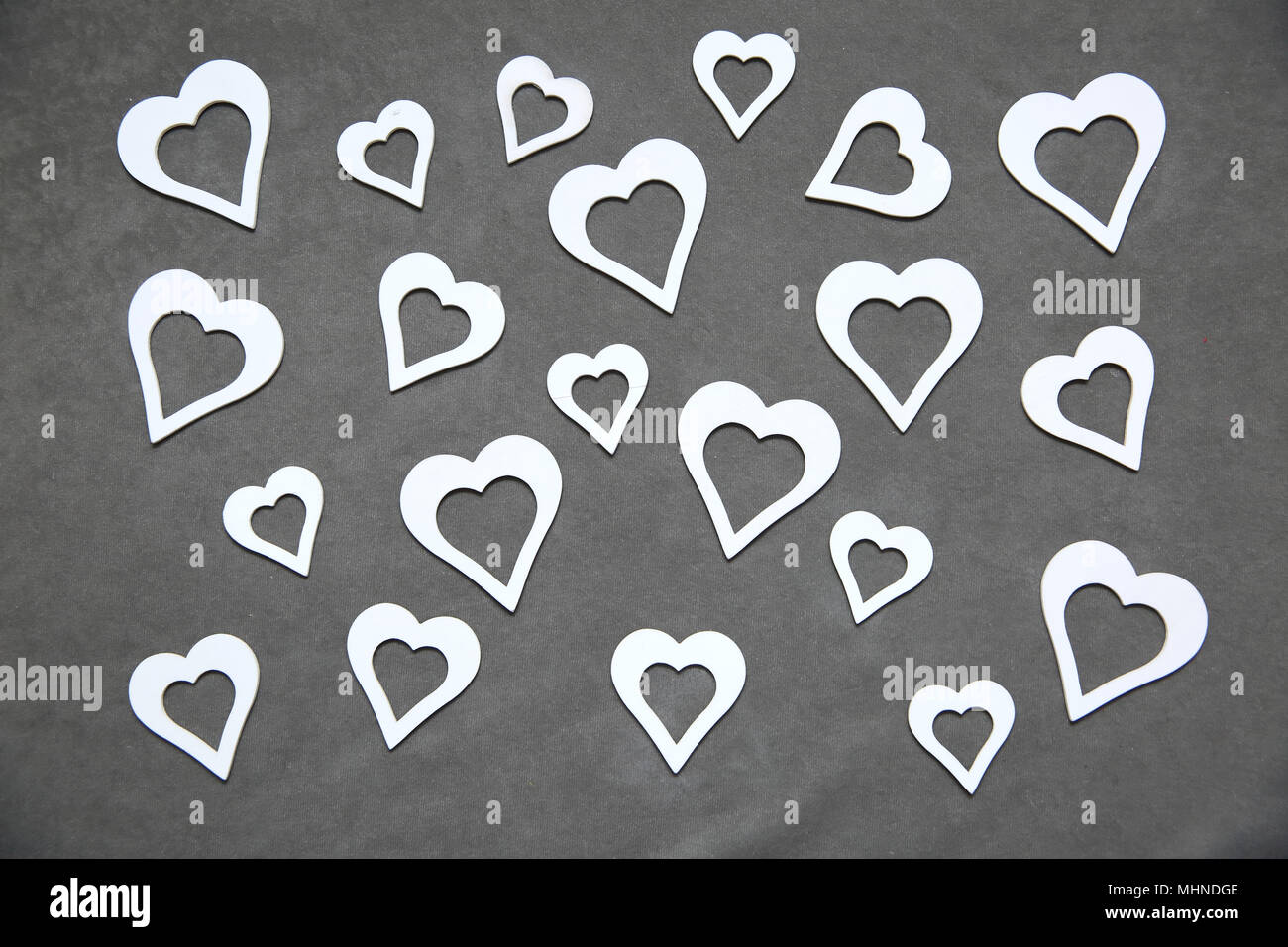 White clean heart on a gray background for all lovers Stock Photo - Alamy