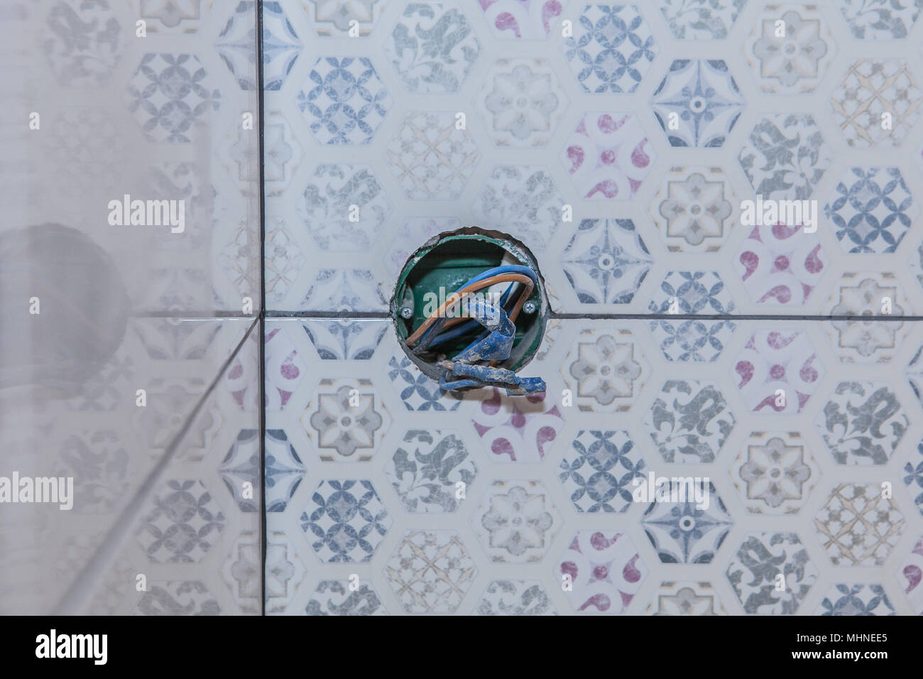 A place has been prepared for the installation of a wall outlet on a ...