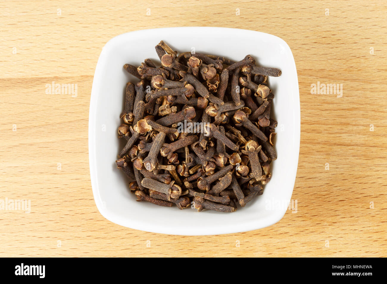 Cloves are the aromatic flower buds of the tree Syzygium aromaticum, a ...