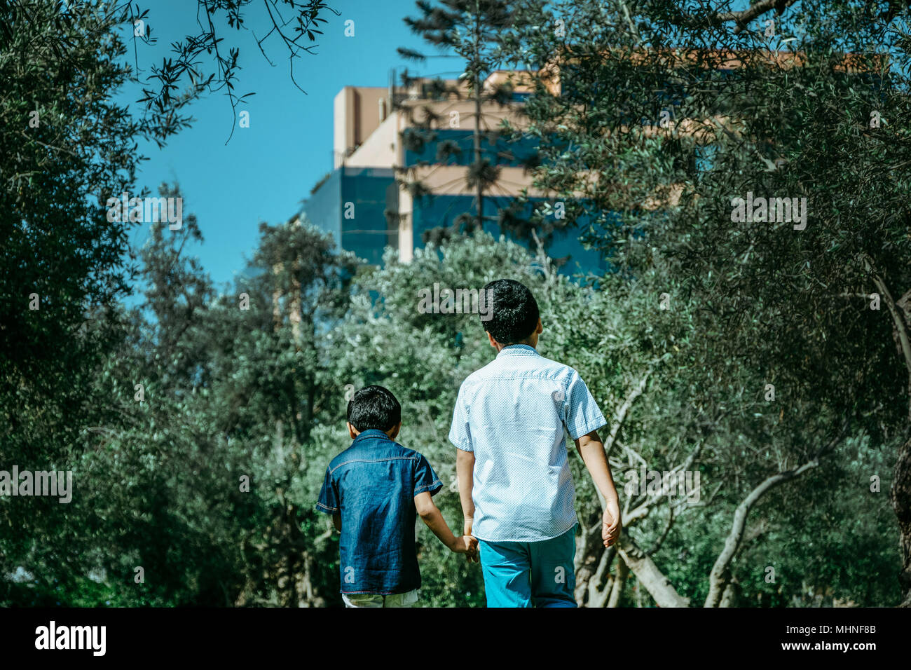 Brothers walking together hi-res stock photography and images - Alamy