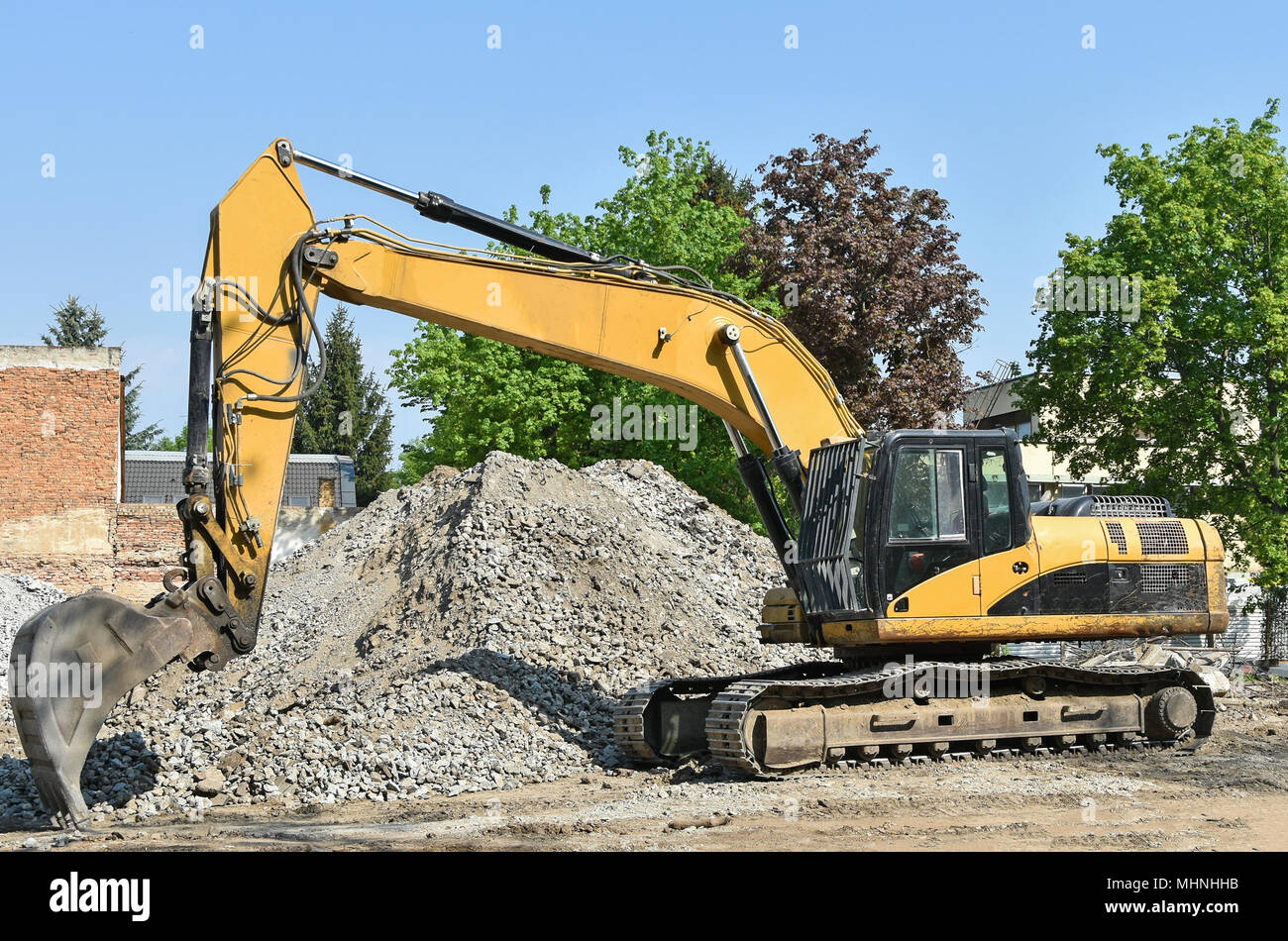 Excavator at the construction site Stock Photo - Alamy