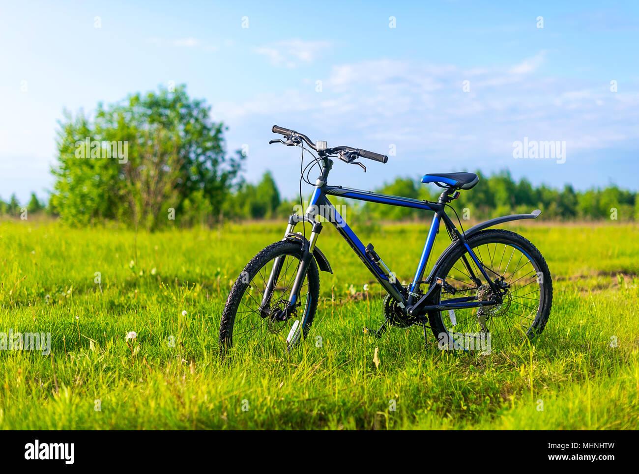 Bicycle rider standing hi-res stock photography and images - Alamy