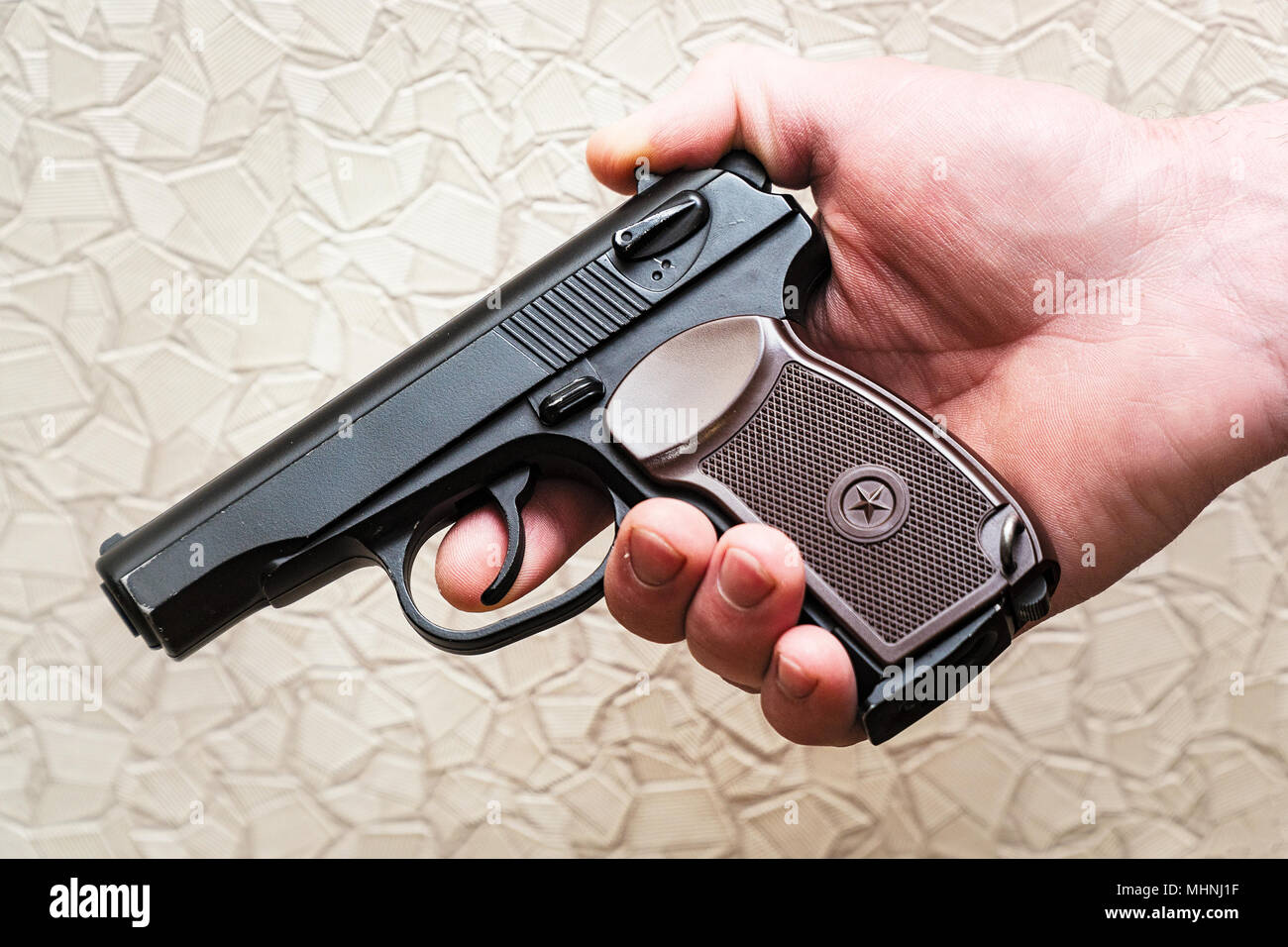 Person holding gun violence sign hi-res stock photography and images ...