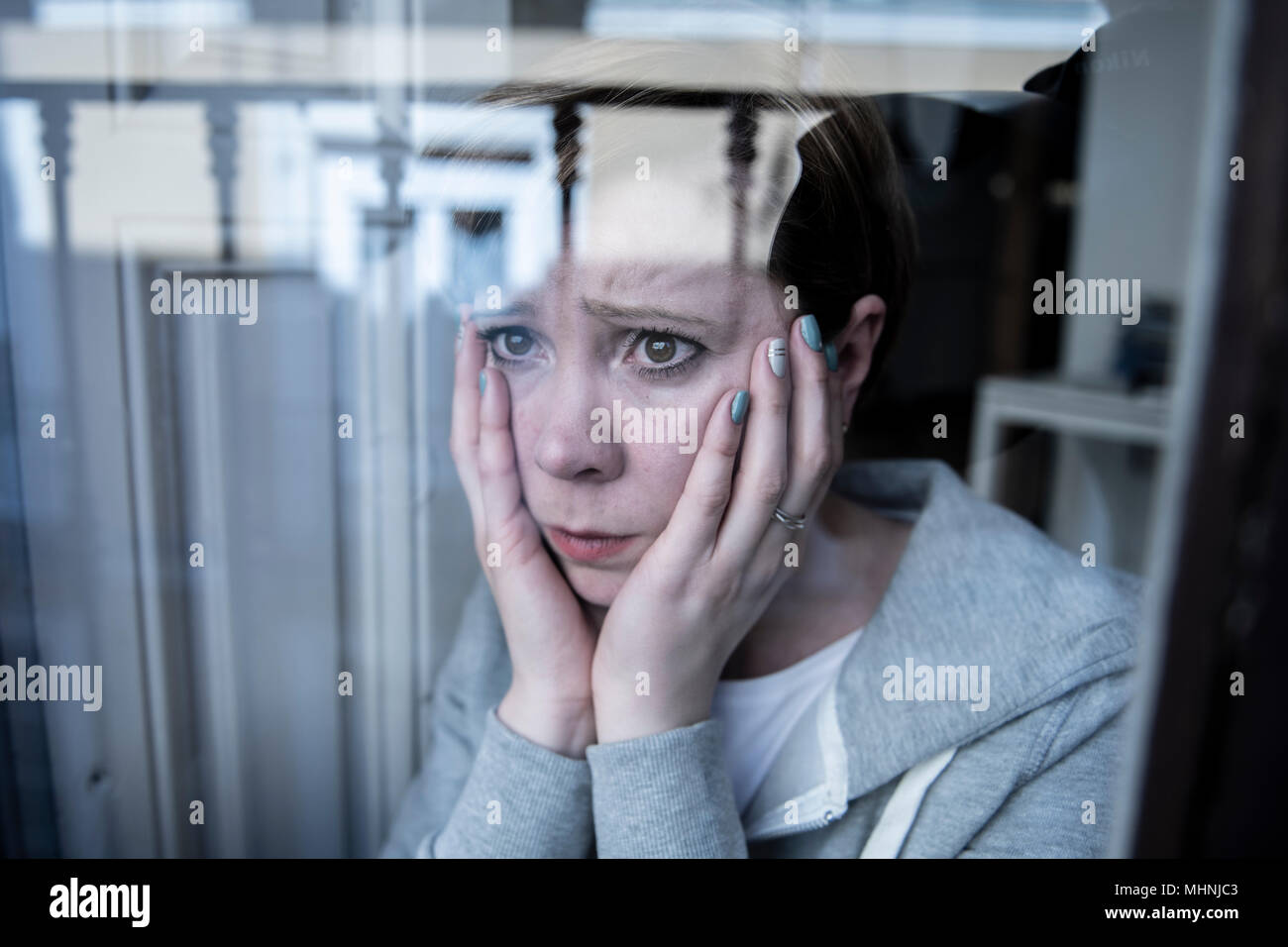 young beautiful depressed unhappy caucasian woman looking worried and ...
