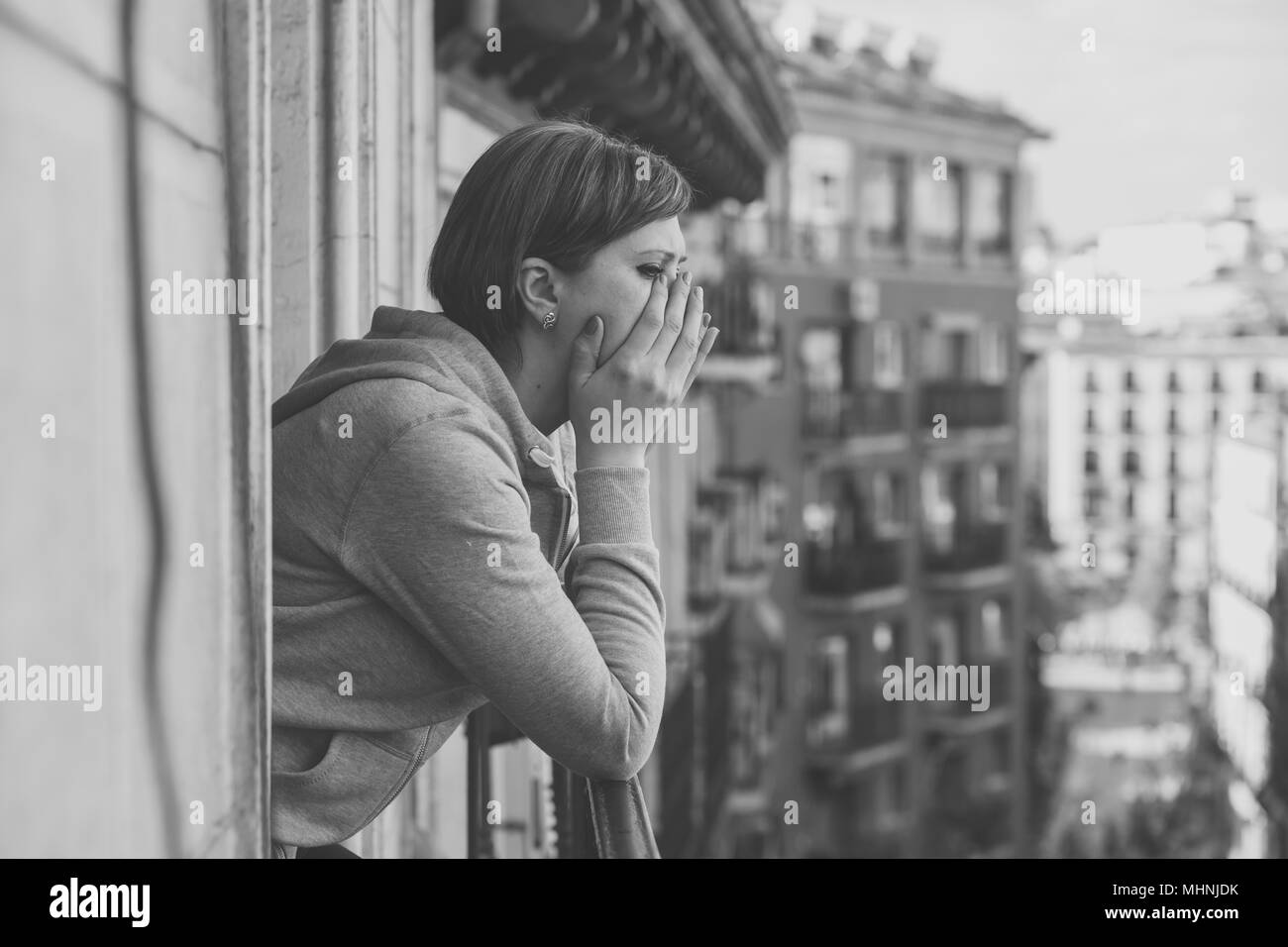 Young attractive,red haired, unhappy lonely caucasian woman with ...