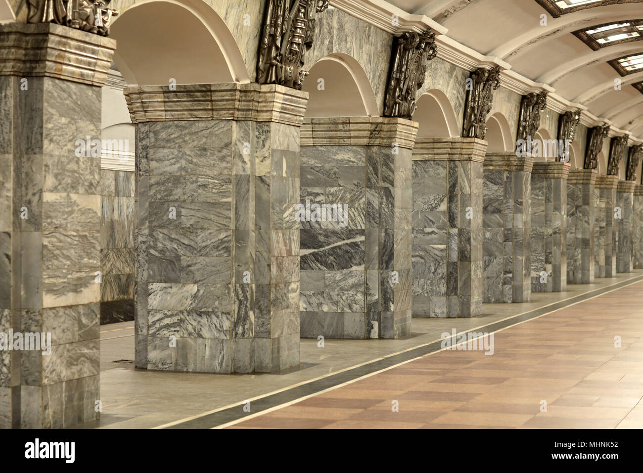 Fragment of the interior with columns lined with gray granite and metal ...