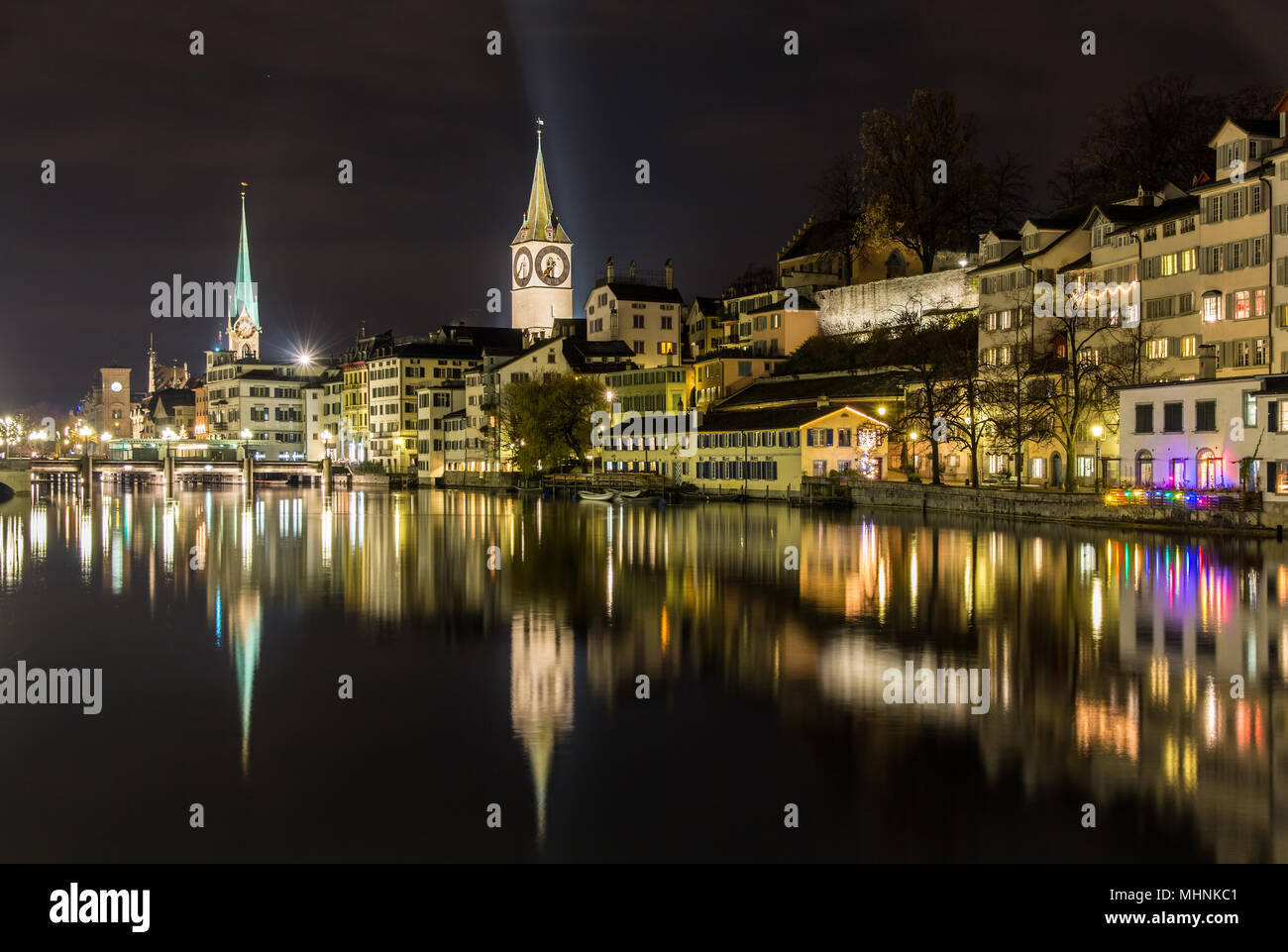 Zurich on banks of Limmat river at winter night Stock Photo - Alamy