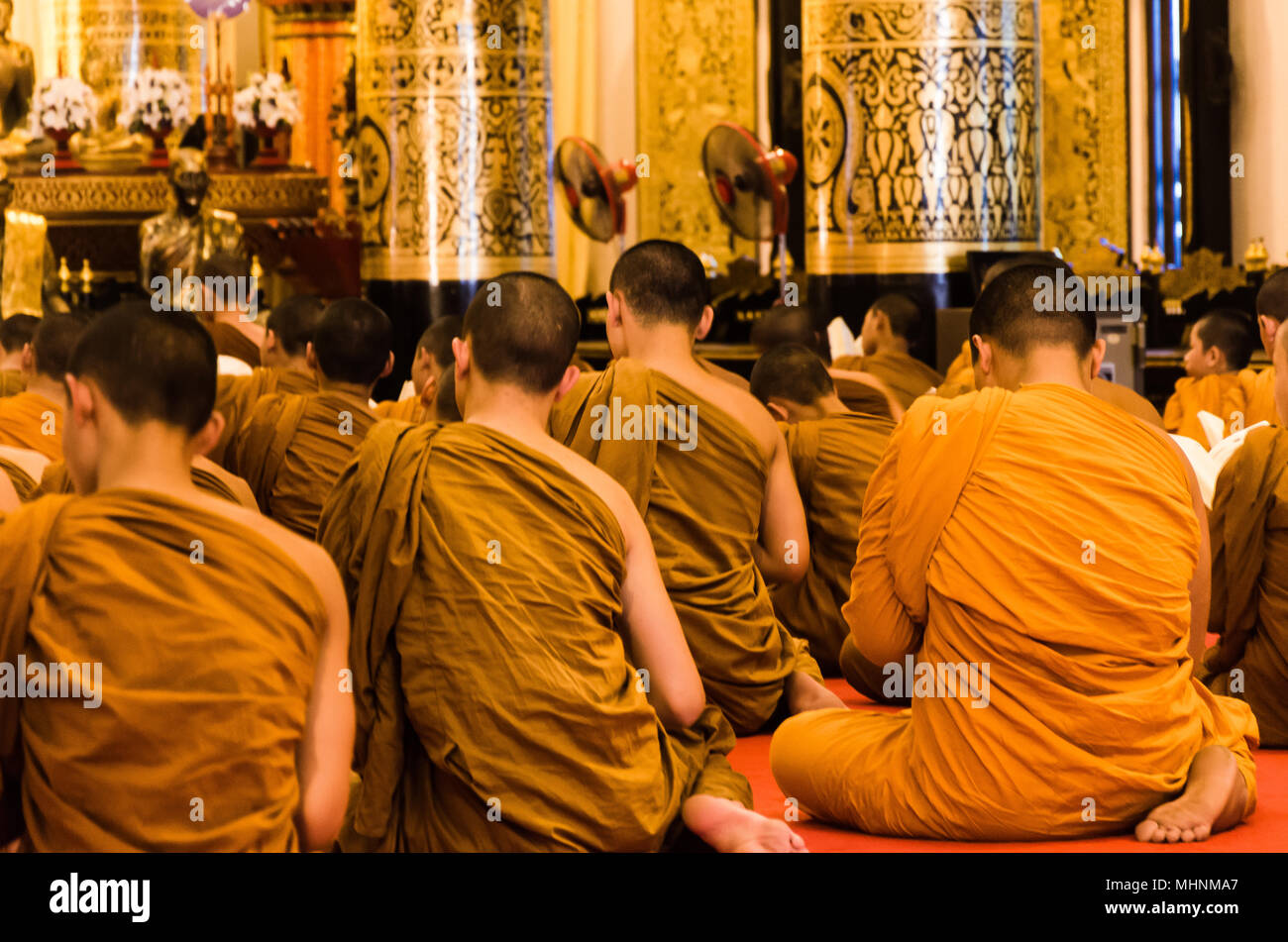 Buddhist monks sitting and gathering for praying Stock Photo - Alamy