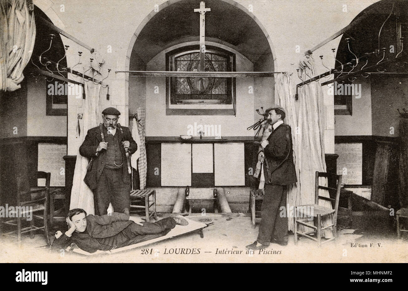 Lourdes - Praying at the Grotto and the Basilica Stock Photo - Alamy