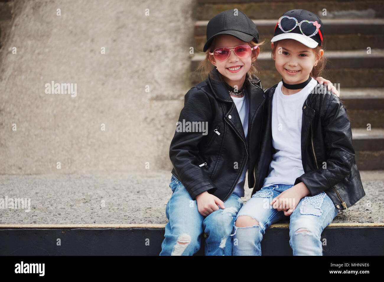 stylish funny little girls on the street Stock Photo - Alamy