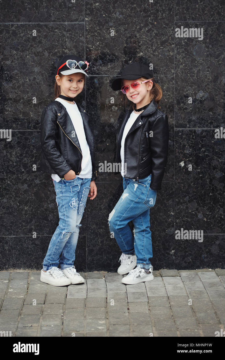stylish funny little girls on the street Stock Photo - Alamy