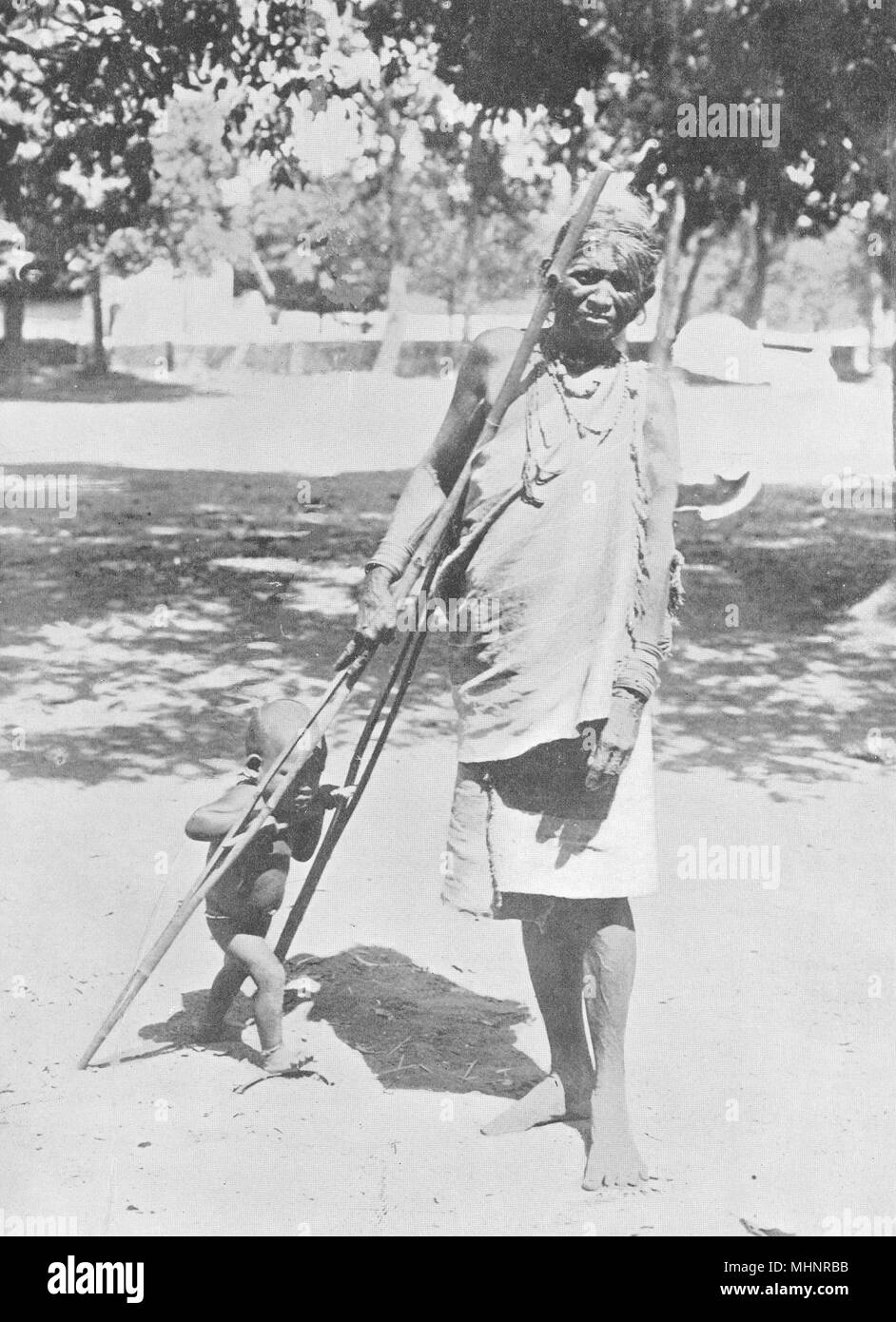 INDIA. A Varanasi coolie teaching baby to walk 1900 old antique print ...
