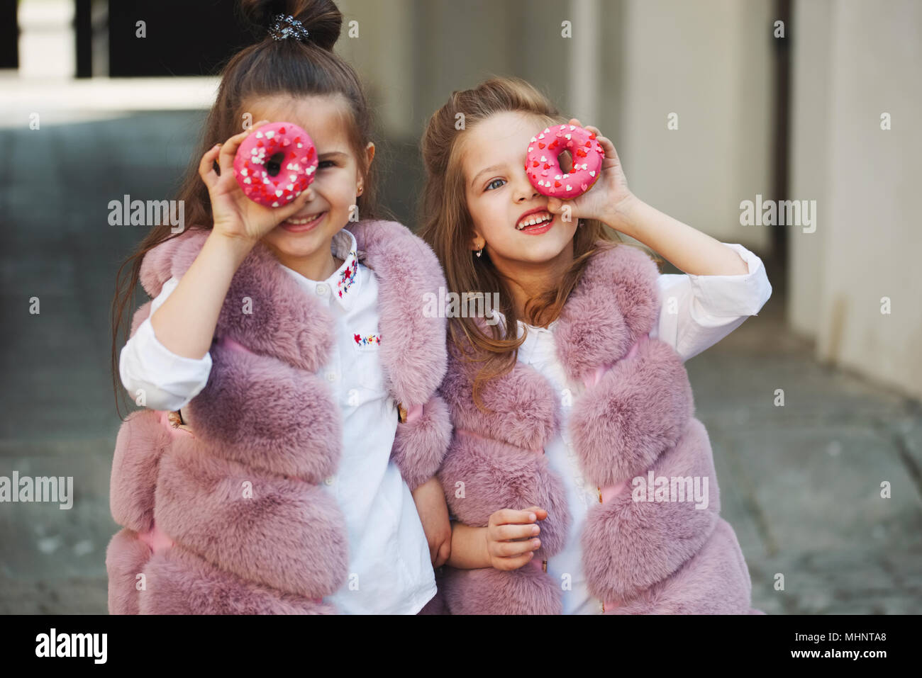 stylish funny little girls on the street Stock Photo - Alamy
