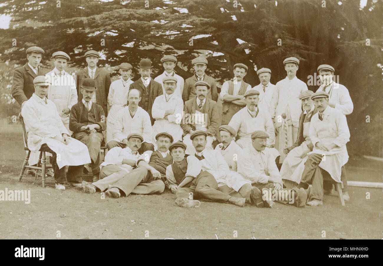 Group photo, large group of workmen Stock Photo - Alamy