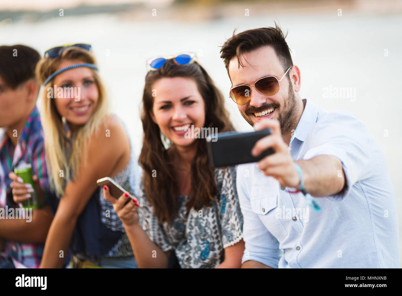 Group of young happy friends having fun time Stock Photo - Alamy