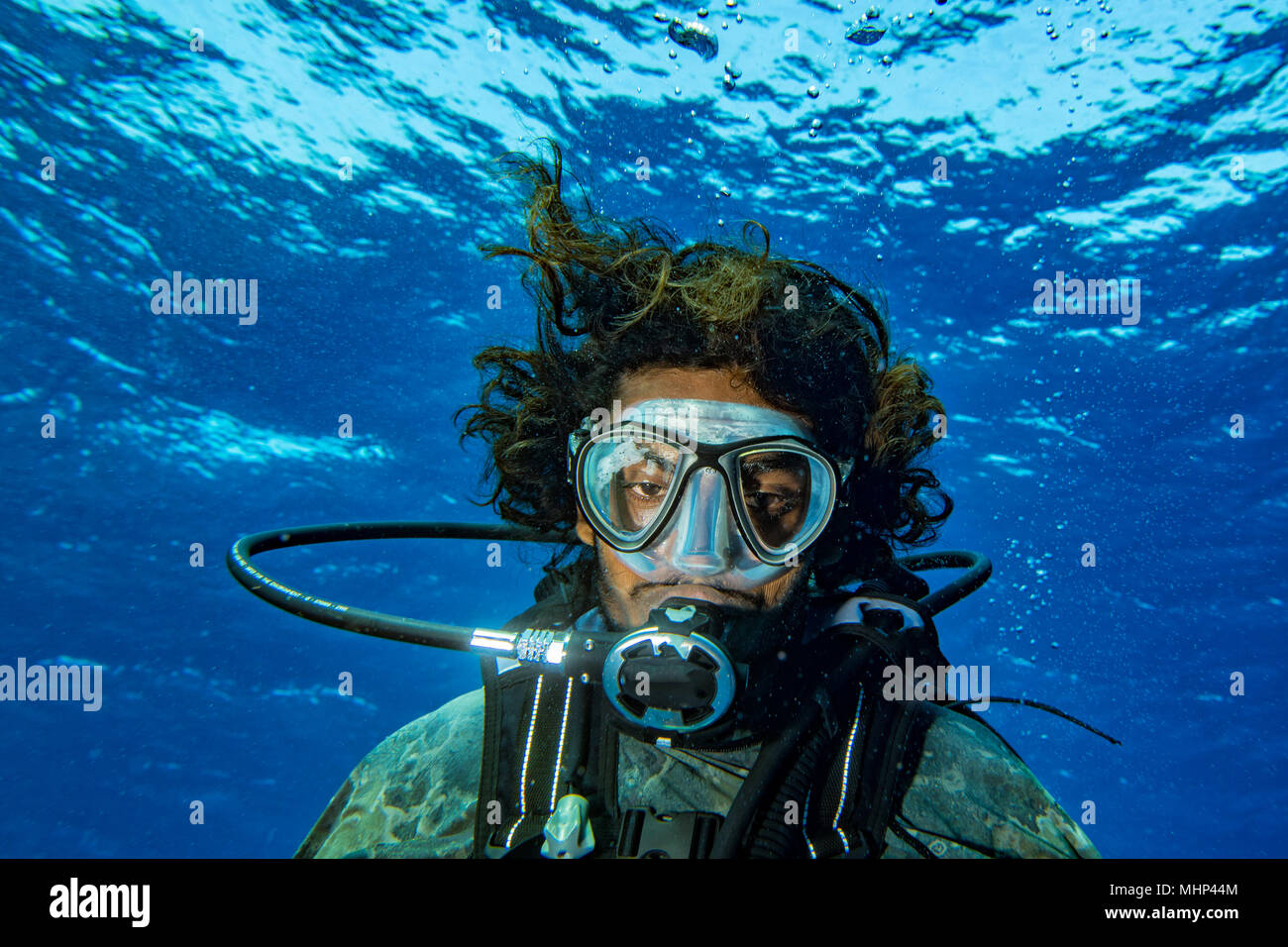 Smile of crazy Scuba diver underwater selfie in the deep blue ocean and ...