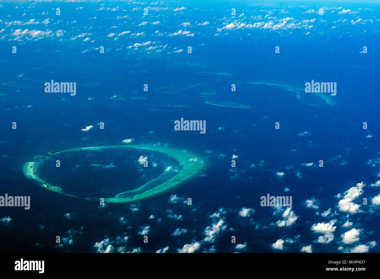 maldives atoll aerial panorama blue water reef Stock Photo - Alamy